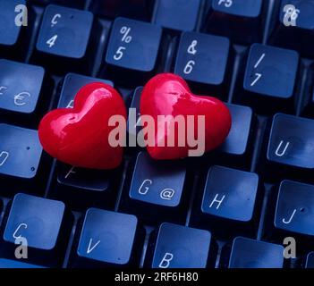 Red dear heart on keyboard Stock Photo - Alamy