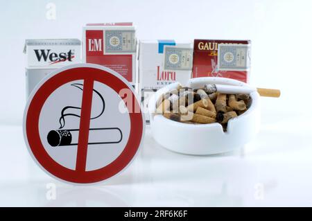cigarette in ashtray and non-smoking sign Stock Photo - Alamy