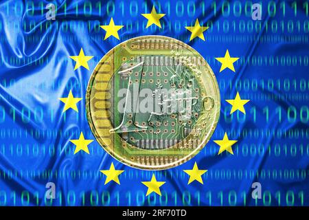 FOTOMONTAGE, Ein-Euro-Münze auf Europa-Fahne mit Computerplatine und ...