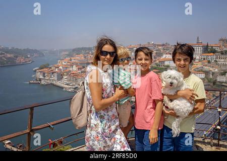 Happy family, visiting Lisbon during summer holiday, people with ...