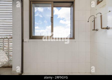 Boiler room of an apartment building with pipes and metering devices. A ...