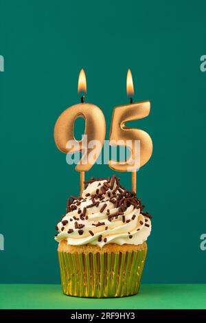 Birthday card with green number 95 candle - Pastel pink background ...