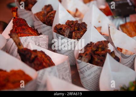 various fried snacks in cones Stock Photo - Alamy