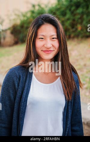 Photo of brunette optimistic cute lady hug paper heart wear blue ...