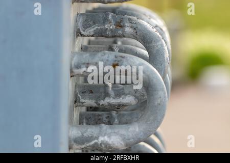 water end flow coil tubes from a large air conditioner close up ...