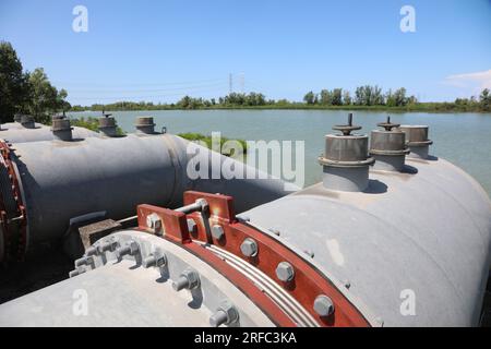 big dewatering tubes of dewatering pump in the industrial site Stock ...