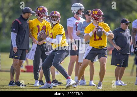 Washington Commanders quarterbacks Jake Fromm stretches during NFL ...