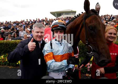 Jockey Danny Gilligan with trainer Gordon Elliott after winning the Tote Galway Plate at Galway ...