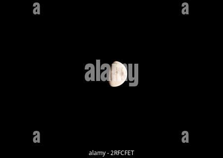 Half moon phase clear black sky Stock Photo - Alamy
