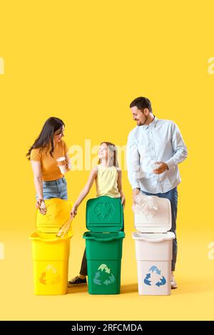 Family sorting garbage in recycle bins at home Stock Photo - Alamy