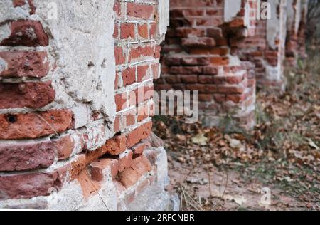 Arched window openings of a destroyed abandoned building. Broken ...