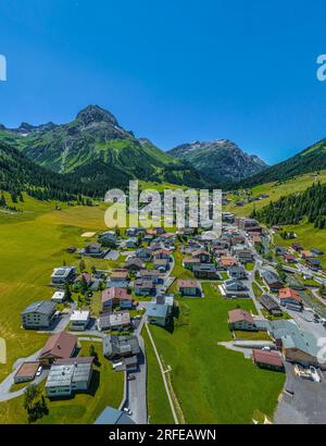 The glamorous mountain resort of Lech am Arlberg in summertime, aerial ...