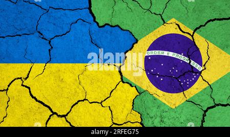 Flags of Brazil and Ukraine on cracked surface - politics, relationship ...