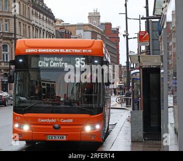 Cardiff single decker electric bus at a bus stop on Westgate Street ...