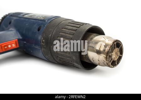 Old PVC pipe heat gun on a white Stock Photo - Alamy