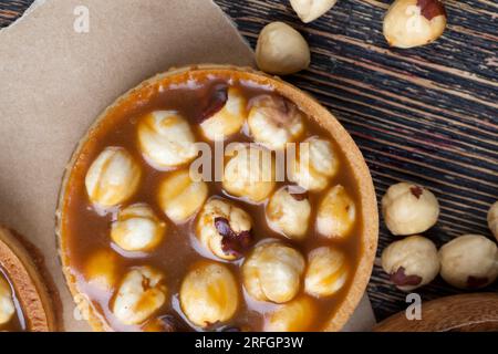 tartlet with salted caramel and hazelnuts, round tartlet with soft ...