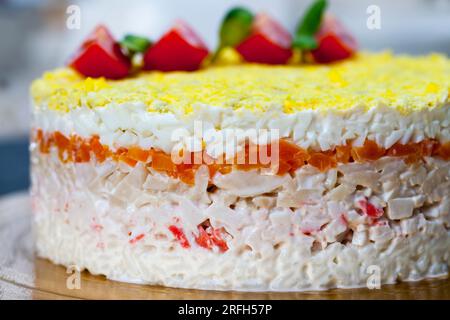 salad made from different ingredients, mayonnaise, carrots, crab meat ...