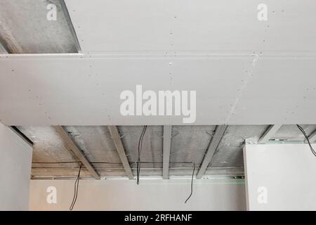 Suspended ceiling structure with profiles for installation of ceiling ...