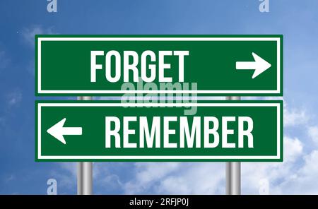 Forget or remember road sign on sky background Stock Photo - Alamy