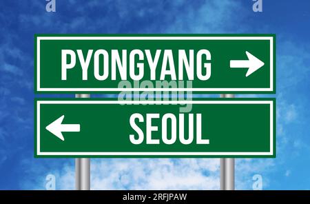 Pyongyang or seoul road sign on blur background Stock Photo - Alamy