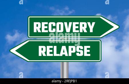 Recovery or relapse road sign on blue sky background Stock Photo - Alamy