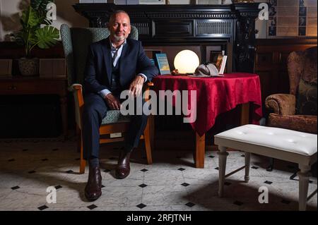 Author and speaker Rob Redenbach poses in the venue of Arthur Conan ...