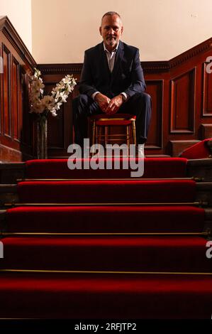 Author and speaker Rob Redenbach poses in the venue of Arthur Conan ...