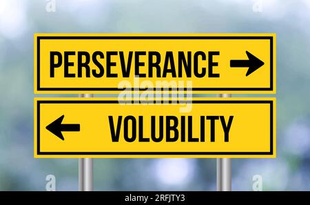 Perseverance road sign on blur background Stock Photo - Alamy