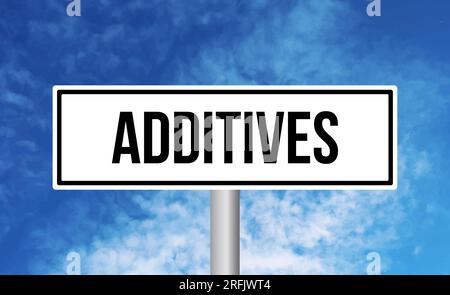 Additives road sign on sky background Stock Photo - Alamy