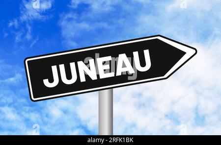 Juneau road sign on blue sky background Stock Photo - Alamy