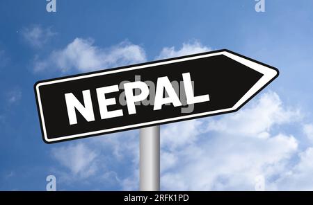 Nepal road sign on blue sky background Stock Photo - Alamy