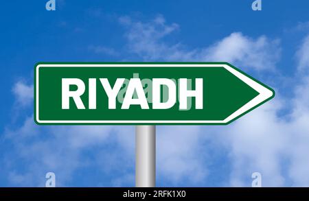 Riyadh road sign on cloudy sky background Stock Photo - Alamy