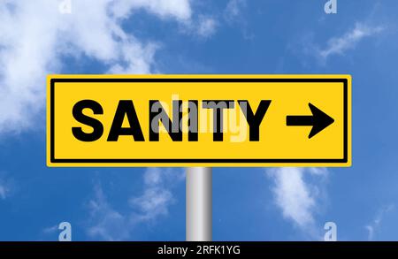 Sanity road sign on sky background Stock Photo - Alamy