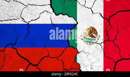 Flags of Mexico and Russia on cracked surface - politics, relationship ...