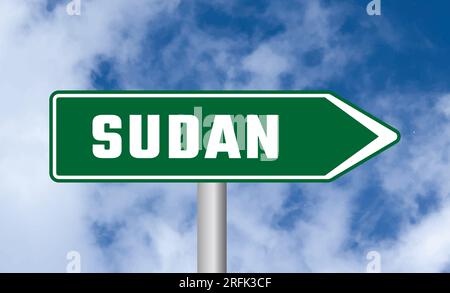 Sudan road sign on blue sky background Stock Photo - Alamy