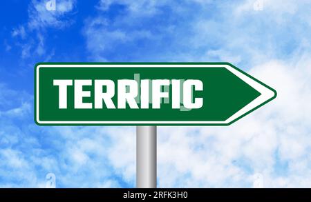 Terrific road sign on blue sky background Stock Photo - Alamy