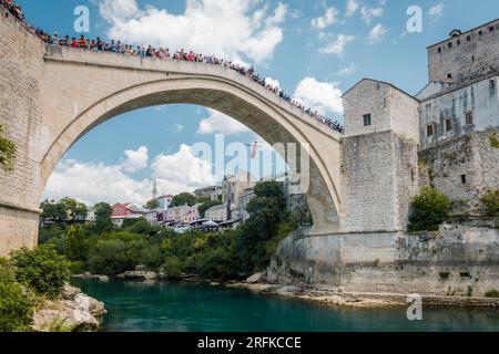 Man jumping 24m from Stari Most (Mostar Bridge) into the Neretva river ...