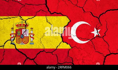 Flags of Turkey and Spain on cracked surface - politics, relationship ...