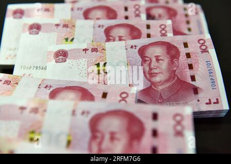 In this photo illustration notes of Chinese currency RMB, with the ...