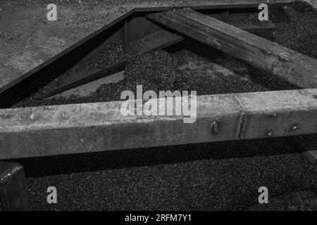 Metal shavings on the surface of lathe, close up. Turned metal ...