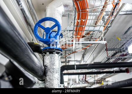 Gas and waste pipelines in the underground premises of the factory ...