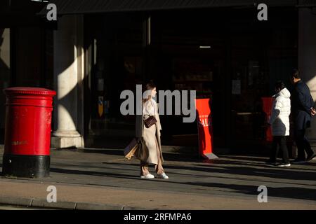 Shoppers walk in central London Stock Photo - Alamy