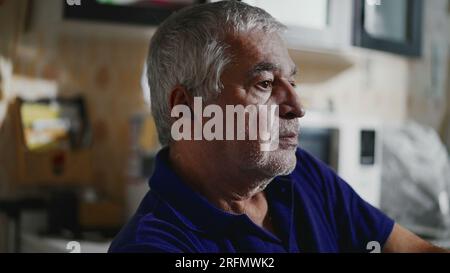 Hopeless Senior Man in Quiet Despair at Home, Close-Up Depiction of ...
