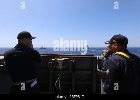 Italian guided missile frigate ITS Carabiniere (F593), observes an F/A ...