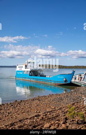 Fraser Island sealing ferry transporting people and vehicles from River ...