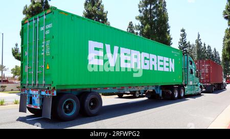 Truck carrying a EVERGREEN Container blocks Stock Photo - Alamy