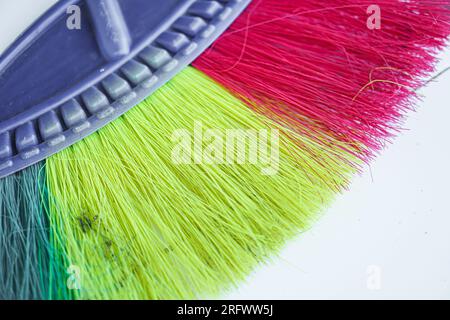 Colorful plastic broom close up picture Stock Photo - Alamy