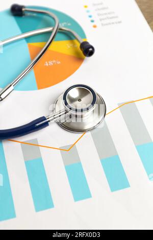 Stethoscope on chart graph. The concept of medical statistics and ...