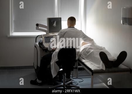 ultrasound machine in the medical office near the couch Stock Photo - Alamy
