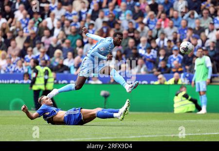 Coventry City's Haji Wright and Leicester City's Caleb Okoli (on bottom ...